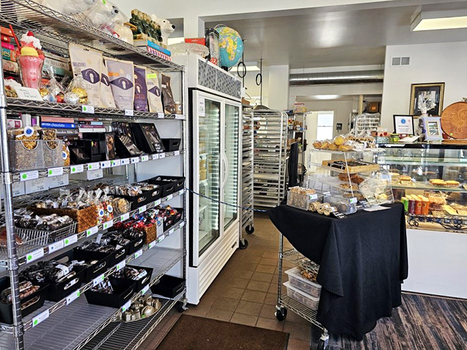 Step into a world where Willy Wonka meets your favorite eccentric aunt's living room. Shelves bursting with treats, a globe perched high &ndash; this isn't just a shop, it's a chocolate adventure!