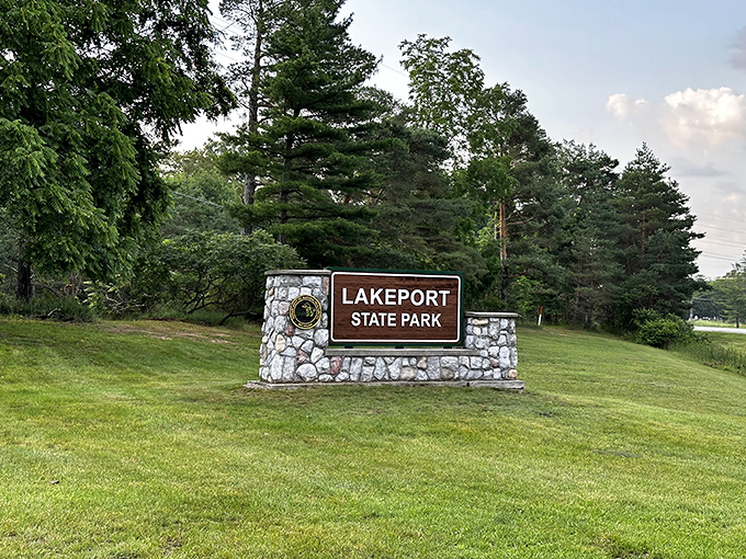 Welcome to paradise, population: you! This stone-and-wood sign isn't just an entrance &ndash; it's a portal to your next great adventure. No ruby slippers required.