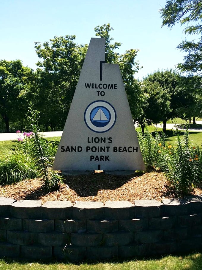 "Welcome to Lion's Sand Point Beach Park" - where the only roaring you'll hear is the sound of laughter and splashing waves.