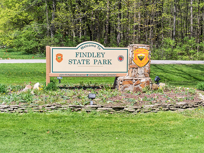 Welcome to nature's playground! This charming sign marks the entrance to Findley State Park, where adventure and relaxation await in equal measure.