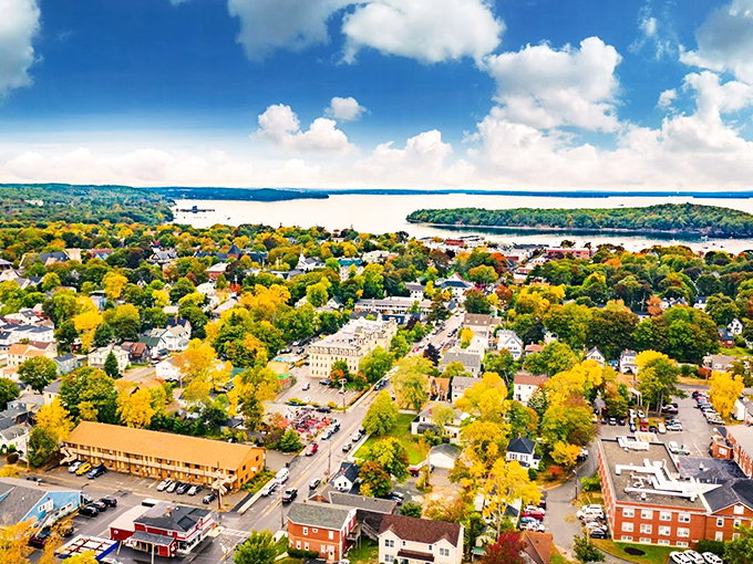 Bar Harbor: Where leaf-peeping meets lobster-eating. Fall foliage frames this charming coastal town, a gateway to Acadia's wonders.
