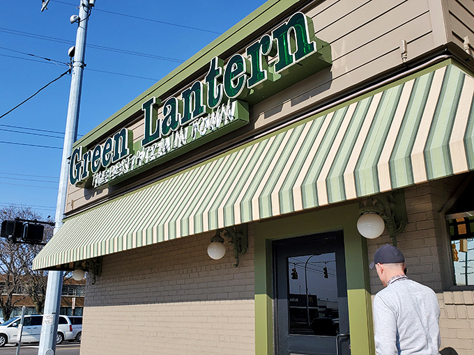 Green Lantern: No superheroes here, just super pizza! This unassuming facade hides a treasure trove of thin-crust wonders.