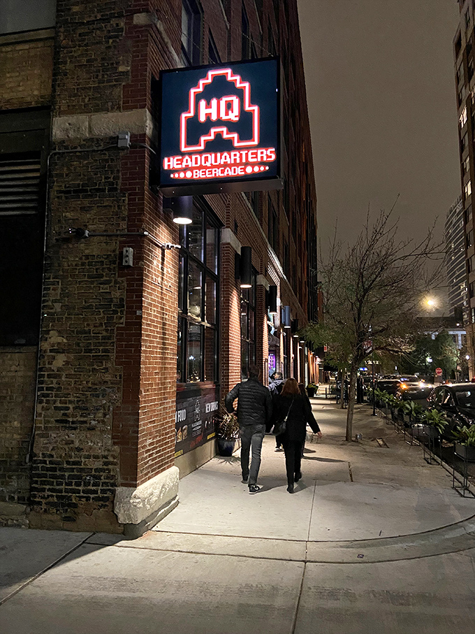 Headquarters Beercade: Welcome to gamer paradise! HQ's sign is brighter than my future, and the games are just as electrifying.