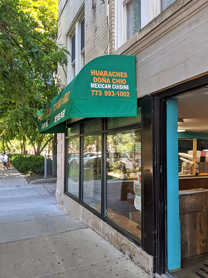Huaraches Doña Chio: Where dreams of perfectly grilled masa come true. That neon sign? It's basically Cupid's arrow for foodies.