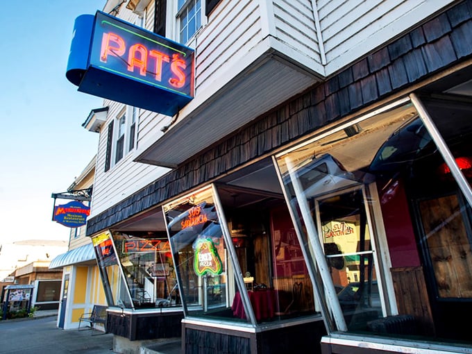 Pat's Pizza: The wise grandfather of Maine's pizza scene. This blue sign has guided hungry souls for generations.