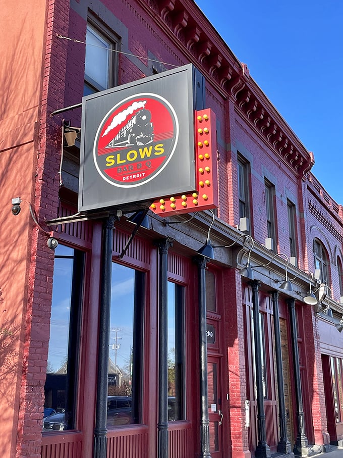 All aboard the flavor express! Slows Bar BQ's locomotive sign is your ticket to a mouthwatering journey through BBQ paradise.