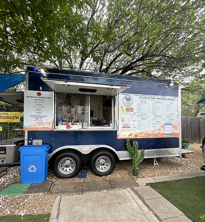 T-Loc's Sonora: A blue oasis in Austin's food desert. These Sonoran-style dogs are like a flavor fiesta wrapped in a tortilla of happiness.