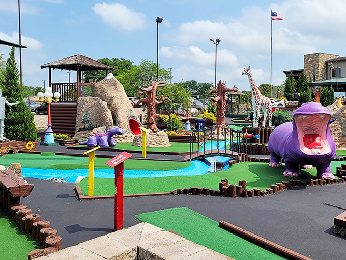 Welcome to Vitense Golfland, where giraffes supervise your putting and hippos judge your form. It's a safari of silly shots!