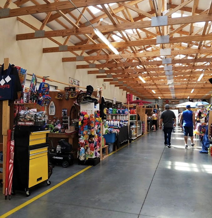 Step into a bargain hunter's paradise! Webb Road Flea Market's wooden beams frame a world of wonders waiting to be discovered.