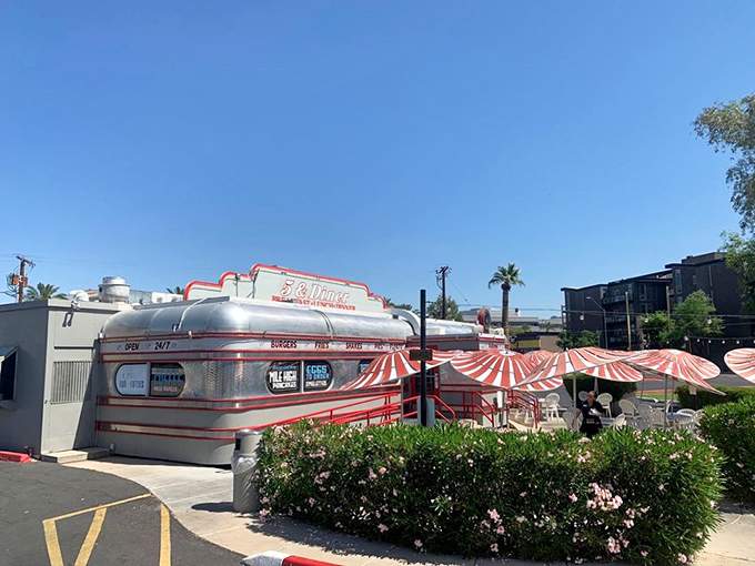 Grab a seat under those red-and-white awnings at 5 & Diner. It's like dining inside a peppermint, but with better burgers!
