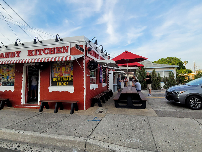 Red umbrellas and striped awnings? This place is more inviting than an ice cream truck on a scorching summer day!