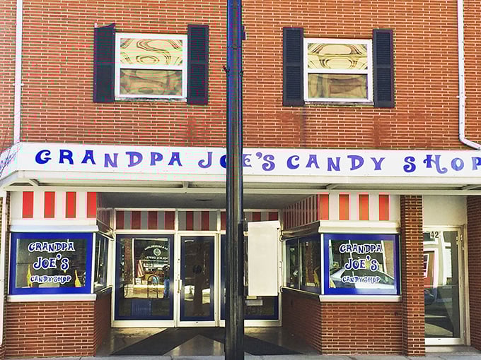 Willy Wonka meets Main Street USA! Grandpa Joe's vibrant storefront promises a kaleidoscope of confectionery delights inside.