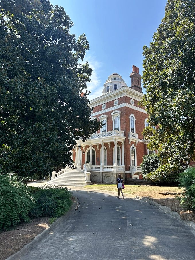 Talk about high society! Hay House's 30-foot music room ceiling could host a giraffe quartet... if giraffes could play instruments.