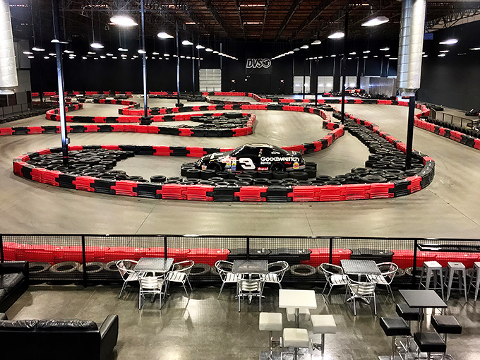 Racing meets retail therapy! MB2's entrance is like the pearly gates for adrenaline junkies. Rev up those shopping carts!