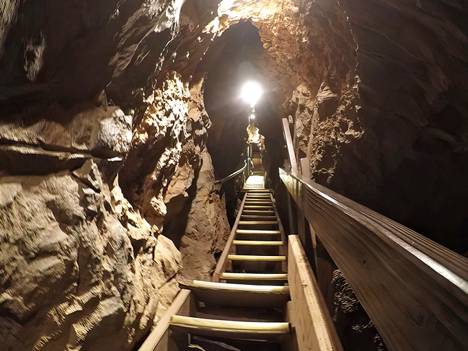 Talk about a grand entrance! This cave mouth looks ready to swallow the Statue of Liberty whole.