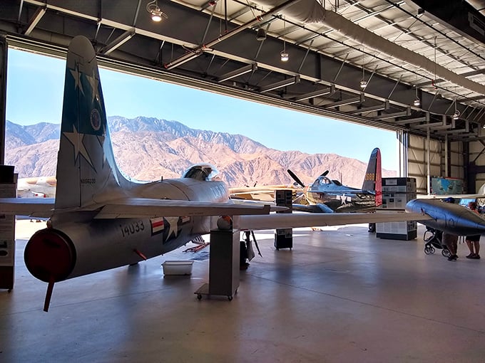Inside, history takes flight. These meticulously restored WWII planes are ready for their close-up, Mr. DeMille!