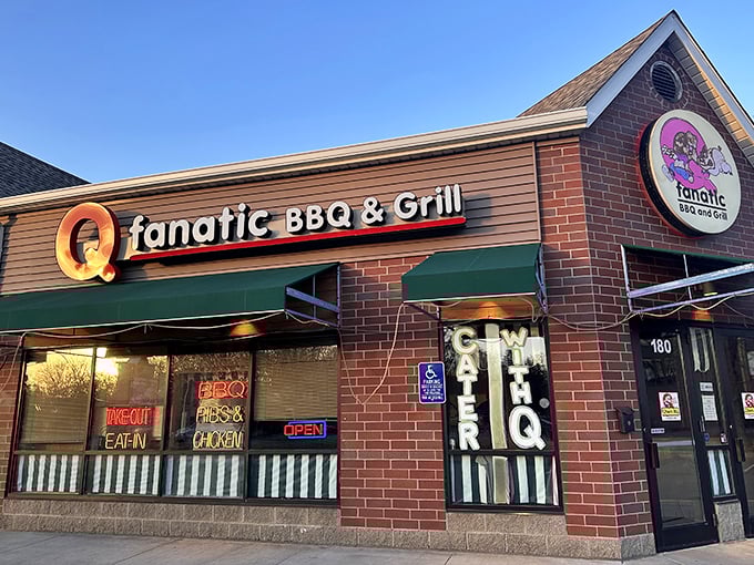By day, a mild-mannered storefront. By night, a superhero of smoked meats. Q Fanatic's sign glows like a bat signal for barbecue aficionados.