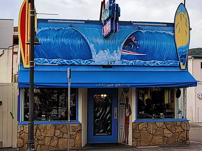 Surf's up at Splash Caf&eacute;! With that giant wave mural, you might need water wings just to order your meal.