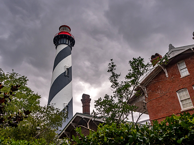 Cloudy with a chance of specters! This towering beacon stands guard over St. Augustine's secrets like a Victorian-era superhero.