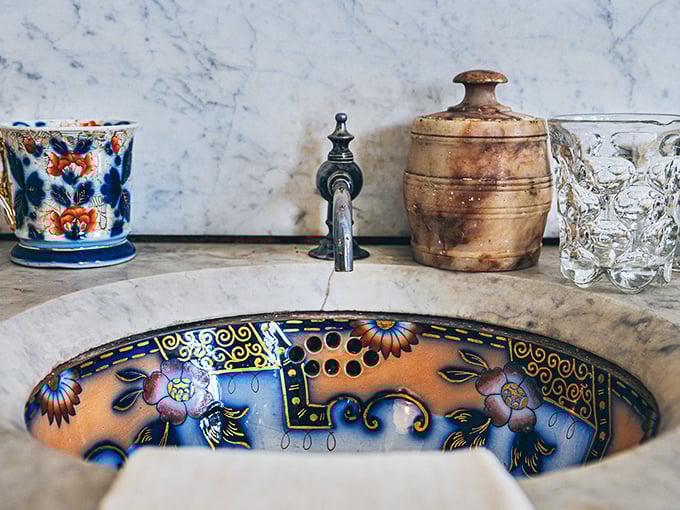 Who knew sinks could be works of art? This beauty looks like it belongs in a museum, not hiding under your great-aunt's potpourri.