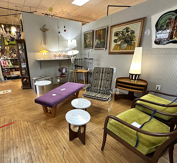 Mid-century modern meets eclectic chic. This furniture display is like "Mad Men" had a quirky love child with "The Jetsons."