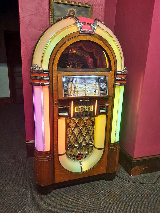 Rock around the clock with this technicolor time machine. This jukebox doesn't just play tunes; it orchestrates a symphony of memories.
