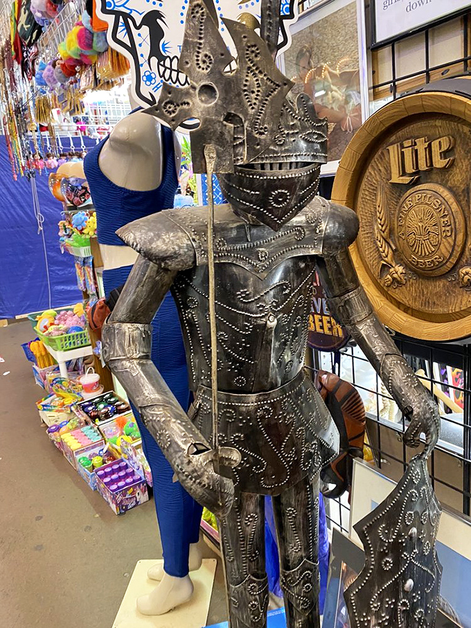 Holy anachronism, Batman! This knightly guardian stands ready to protect your treasures... or maybe just your garden gnomes.