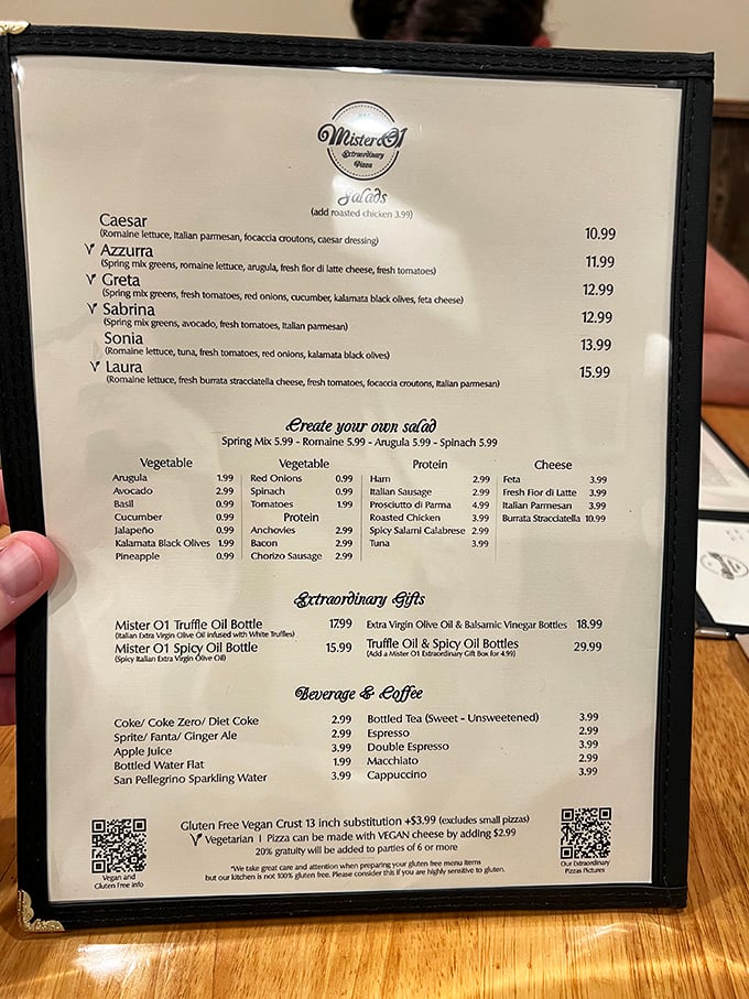 A menu that reads like a love letter to pizza. Choosing just one might be harder than picking a favorite Beatles song!