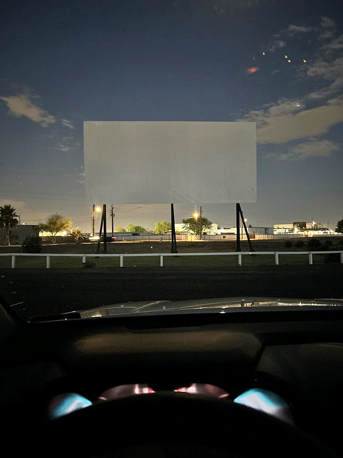 Lights, camera, action! The massive screen comes to life against the night sky, transforming your car into the best seat in the house.