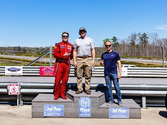 "Podium finish or bust! These racers look happier than kids who've found the secret cookie stash."