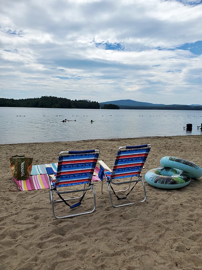 "Beach chairs and floaties: the universal language of summer fun." A slice of paradise awaits, with striped chairs ready for lounging and inflatable rings itching for a dip.
