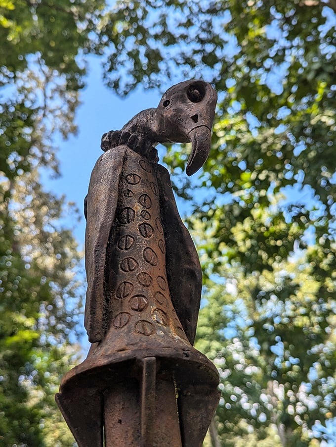 "Part alien, part ancient deity, this metallic figure reaches for the sky. Who says rust can't be regal?"