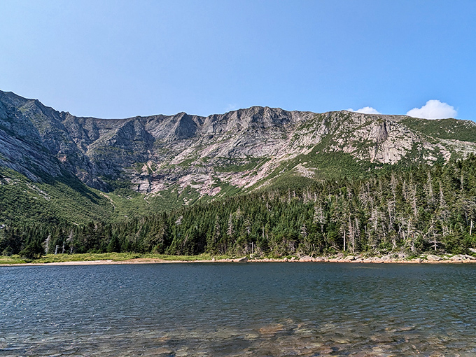 Chimney Pond: Where mountains meet sky in a mirror so still, you'll wonder if you've stumbled into a Bob Ross painting.