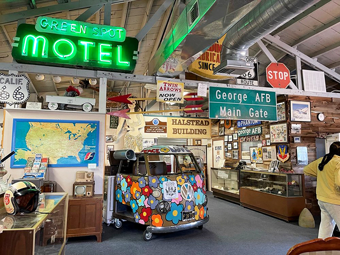 Step into a kaleidoscope of nostalgia! This groovy VW bus, surrounded by Route 66 memorabilia, is your ticket to a far-out journey through time.