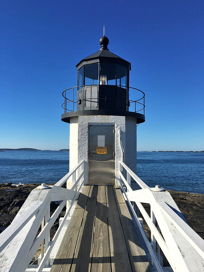 Walk the plank... to enlightenment! This wooden walkway leads to the lighthouse, offering a chance to channel your inner sea captain.