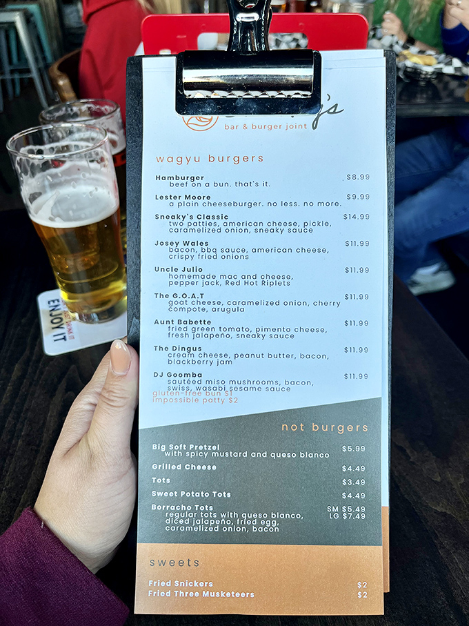 Behold, the menu of dreams! From classic cheeseburgers to the intriguingly named "DJ Goomba," Sneaky's is serving up creativity between buns. Decisions, decisions...