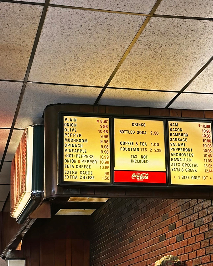 Menu board or modern art? Either way, it's a masterpiece of mouthwatering options that'll have you pondering life's greatest question: "How many toppings is too many?"