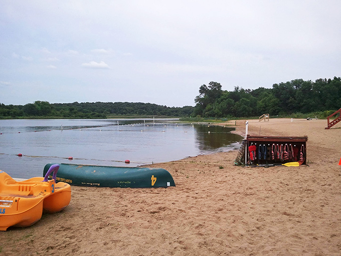 Beach day, Illinois style! Who needs the ocean when you've got this sandy slice of Midwest paradise? Canoes and kayaks await your aquatic shenanigans.