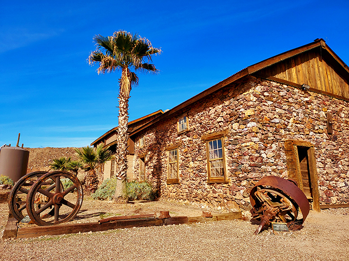 This stone house could tell tales of gold rush dreams. Its sturdy walls have weathered more storms than a soap opera character's love life.