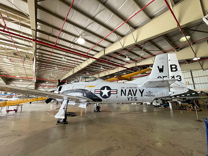 Ahoy there, sky sailor! This Navy beauty might not float, but it sure knows how to command attention in its new landlocked home.