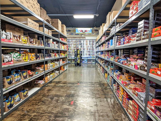 Aisle after aisle of sugar-coated bliss! It's like someone took your grandma's secret candy drawer and supersized it to warehouse proportions.
