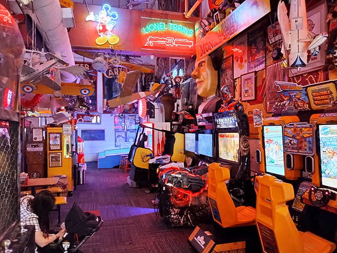 Pac-Man meets Picasso in this neon-lit labyrinth. It's where your quarters go to party and your high scores come to die. Game on!