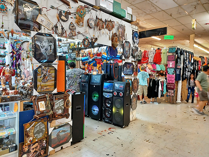 It's like Aladdin's cave met a rock concert! This booth is a sensory overload of art, accessories, and enough speakers to start your own music festival.
