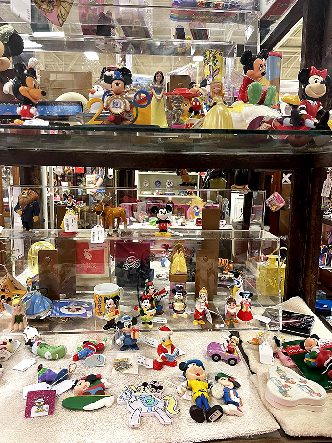 Mickey's retirement home? This display case is bursting with Disney magic from every era. Nostalgia overload guaranteed!