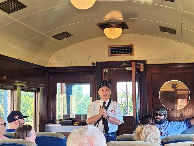 "Tickets, please!" Our dapper conductor is serving up history with a side of charm. No DeLorean required for this trip to the past!