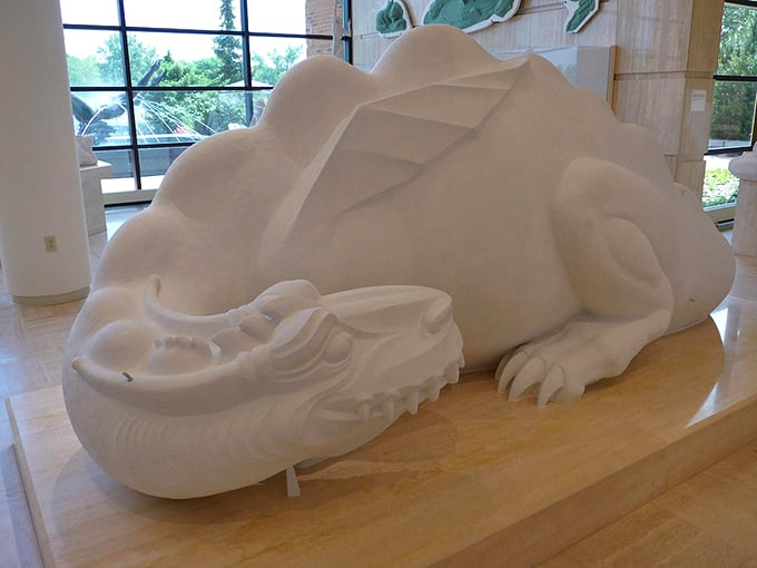 Is it a dragon? A dinosaur? Or just the world's most elaborate pillow? This alabaster beast invites you to ponder life's great mysteries.