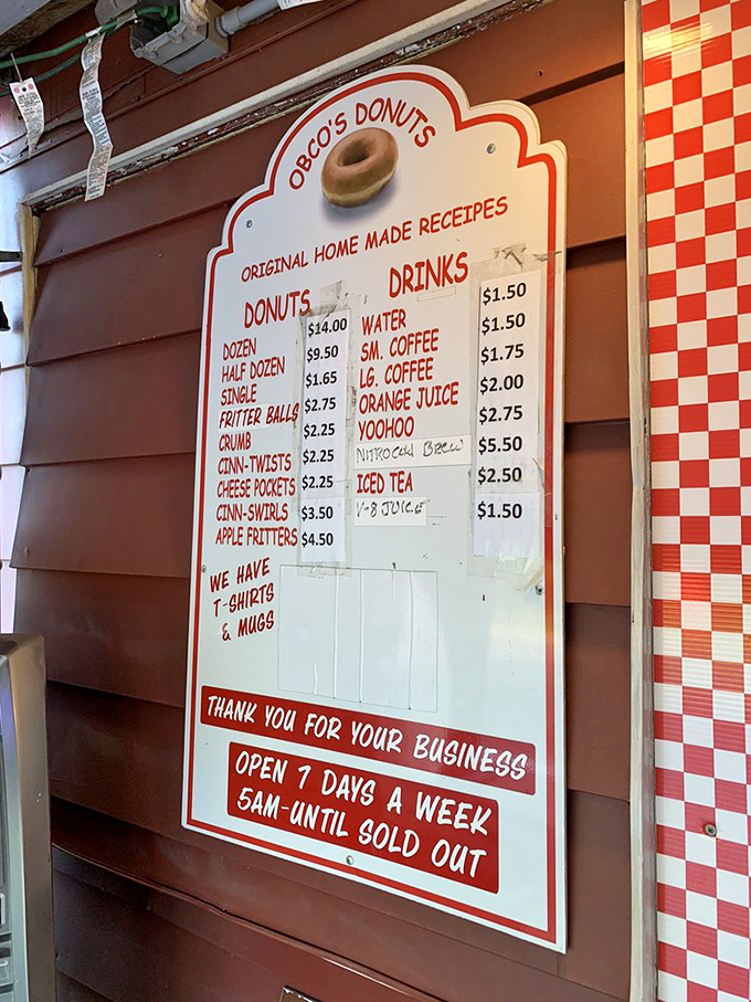 The menu board: a roadmap to happiness. Who knew paradise could be so affordable? Donuts and drinks that won't break the bank!