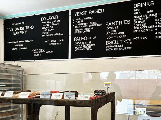 Decisions, decisions! The menu board at Five Daughters reads like a love letter to carbs, with tempting options that'll have you wishing for a bigger stomach. 