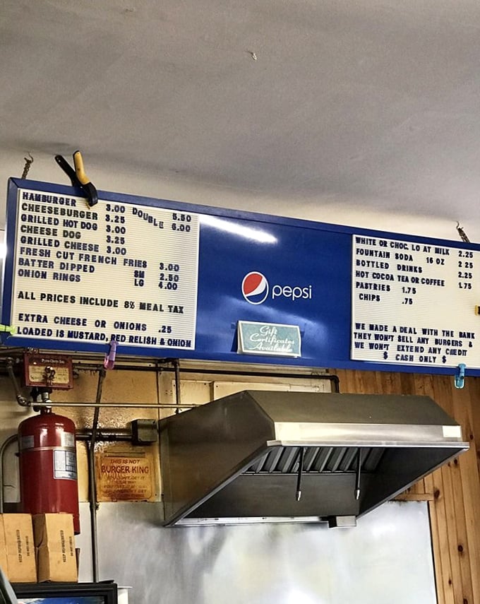 Decisions, decisions! This menu board is like a roadmap to flavor town, with prices that'll make your wallet breathe a sigh of relief.