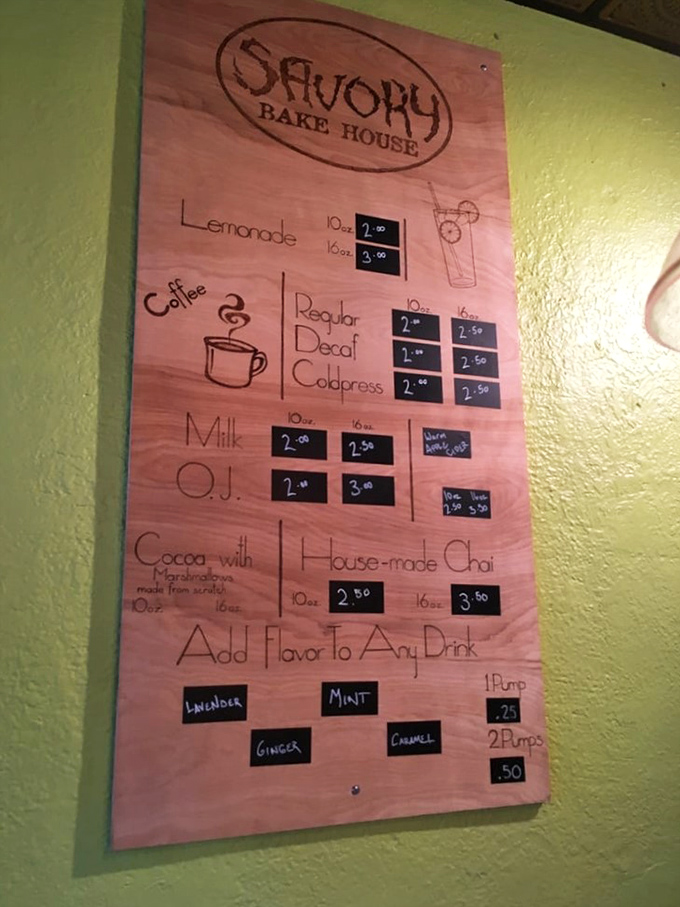 Decisions, decisions! This charming menu board offers liquid happiness for every palate. Coffee, chai, or cocoa – pick your poison!